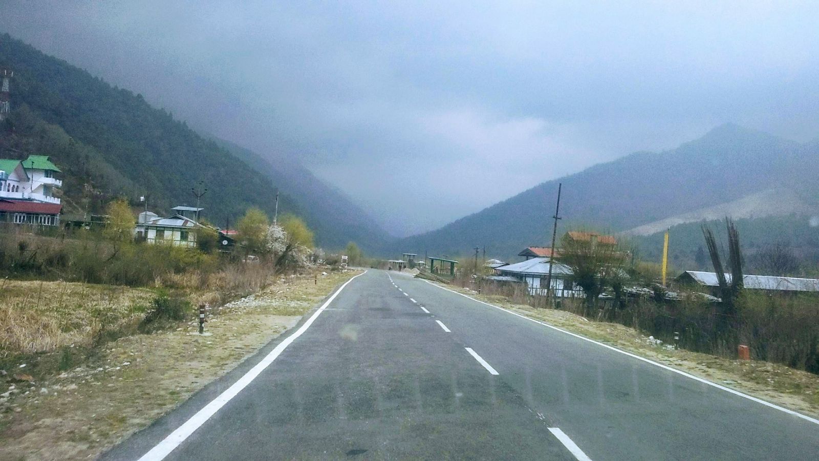 Driving through Shergaon village - Willow trees on the both side of the ...